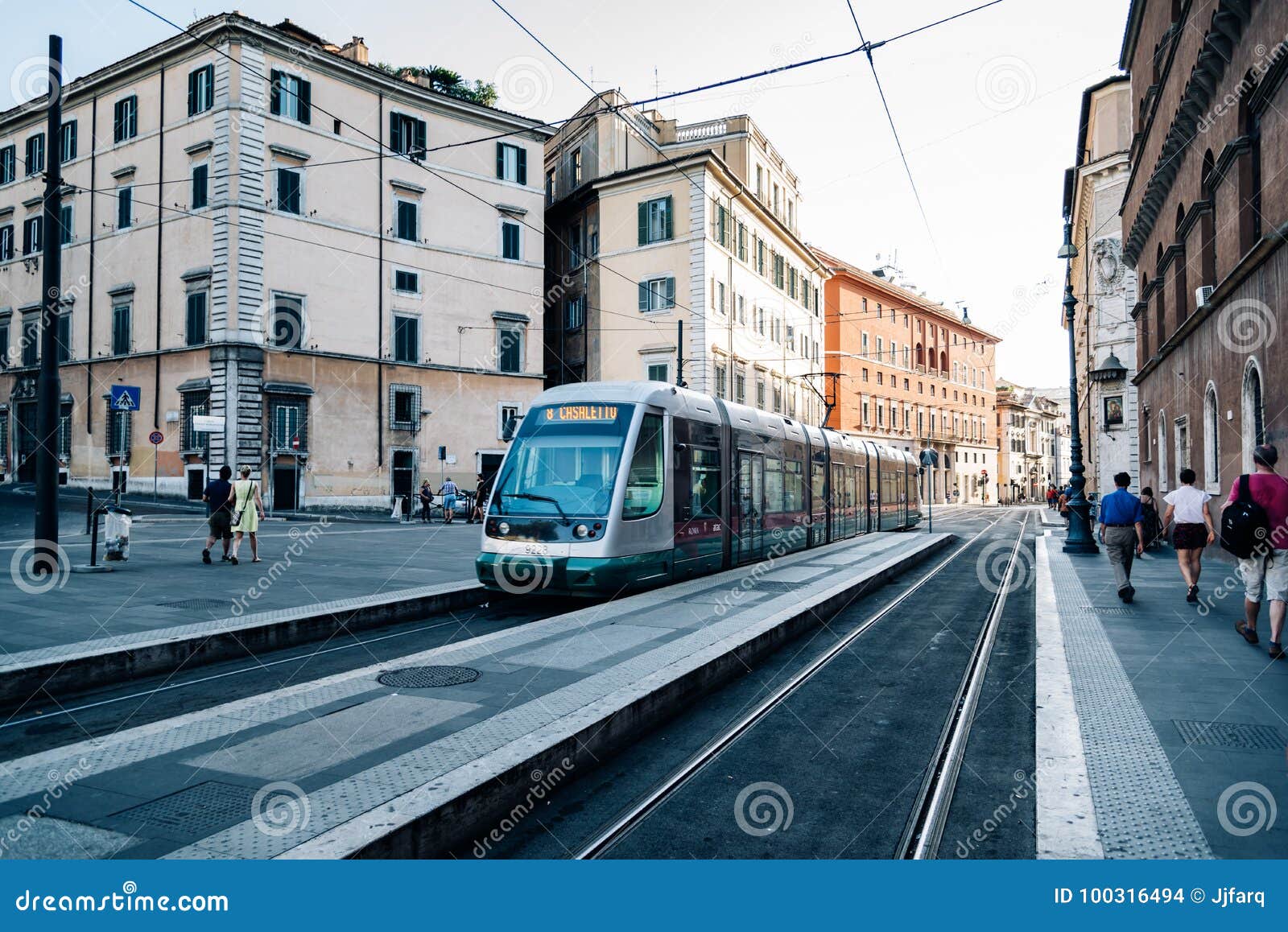 Tram in street in Rome editorial stock image. Image of square - 100316494