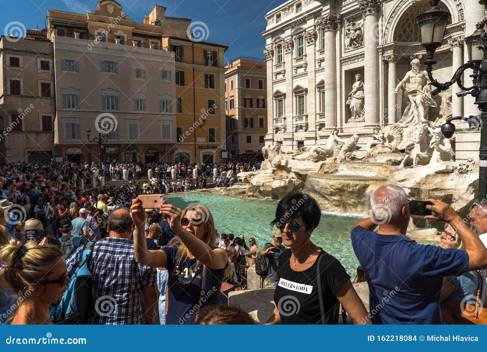 Crowds of Tourists Near Famous Trevi Fountain in Rome, Italy. Tourists ... Crowds of Tourists Near Famous Trevi Fountain in Rome, Italy. Tourists ...