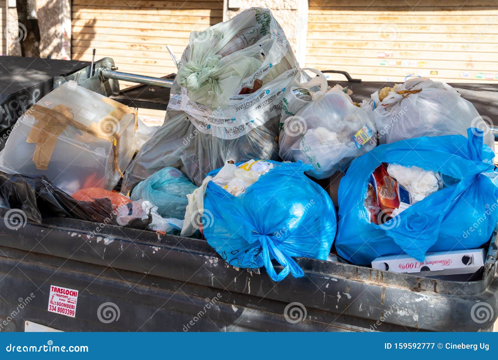 Overflowing garbage cans editorial photography. Image of litter - 159592777