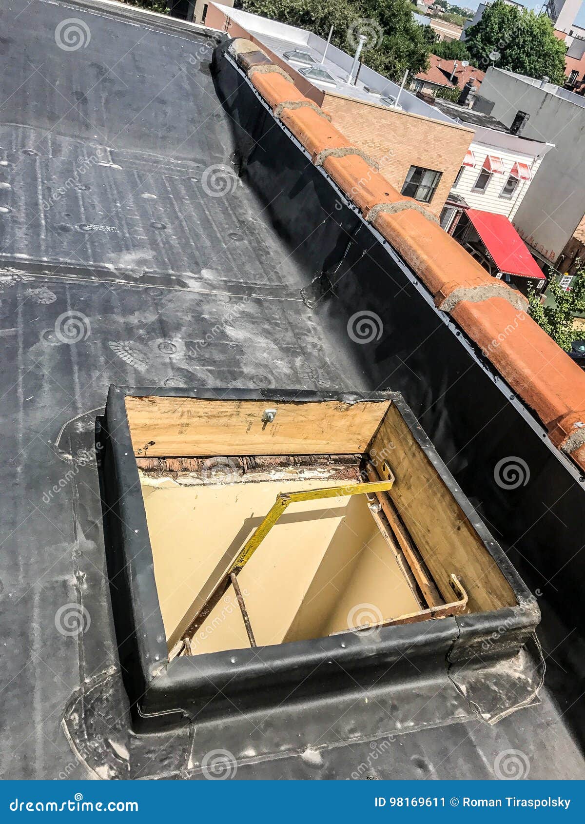 Roof Access Stairway With Wooden Exterior Pannels And Slats With Ladde ...