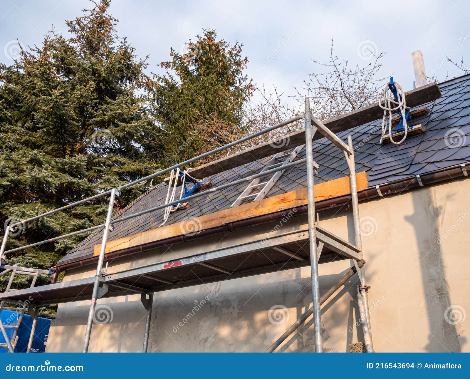 The Roof is Being Redone on the House Stock Photo - Image of roof ...