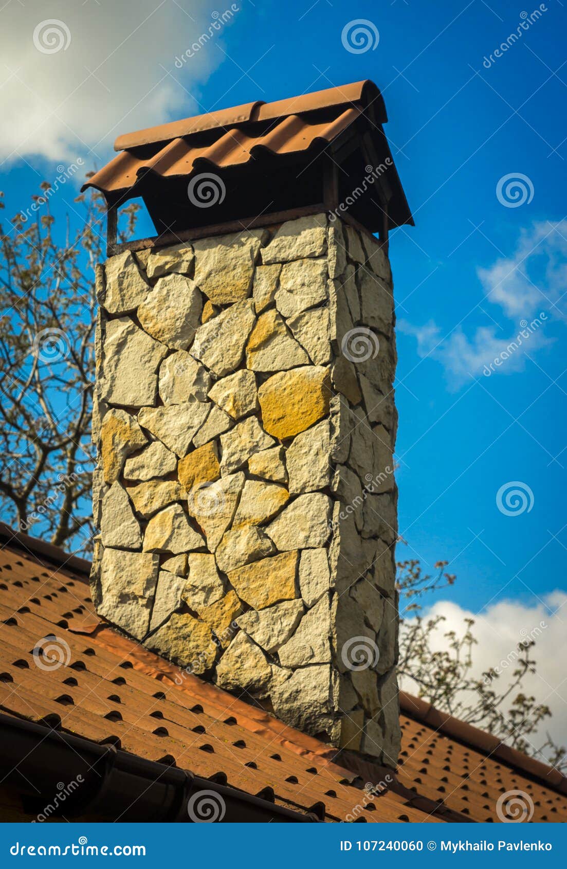 Chimney On Modern House With Slanted Roof And Red Adobe Tiles In Late ...