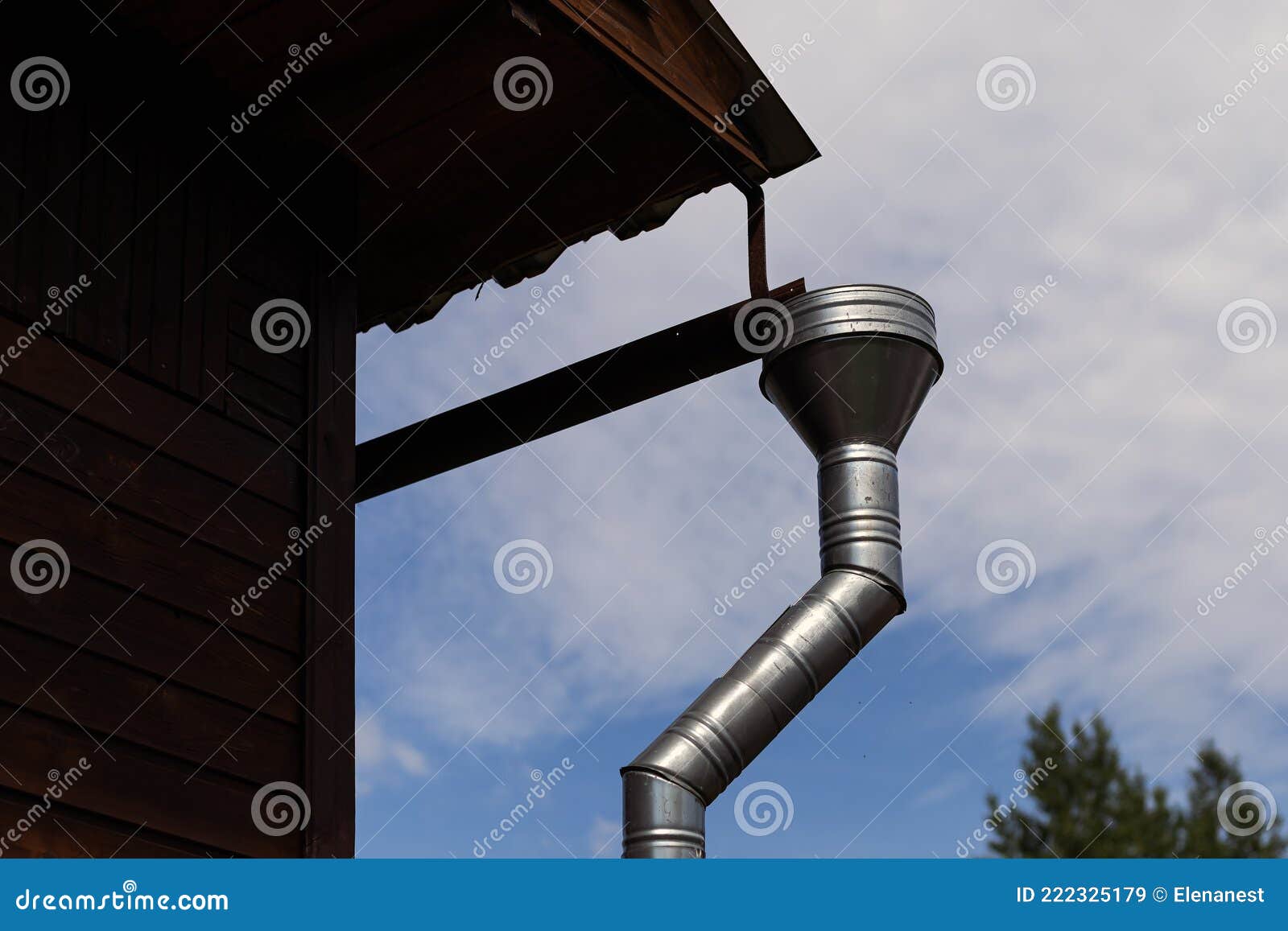 Roof Edge of a Small House with Installed Rainwater Drainage System ...