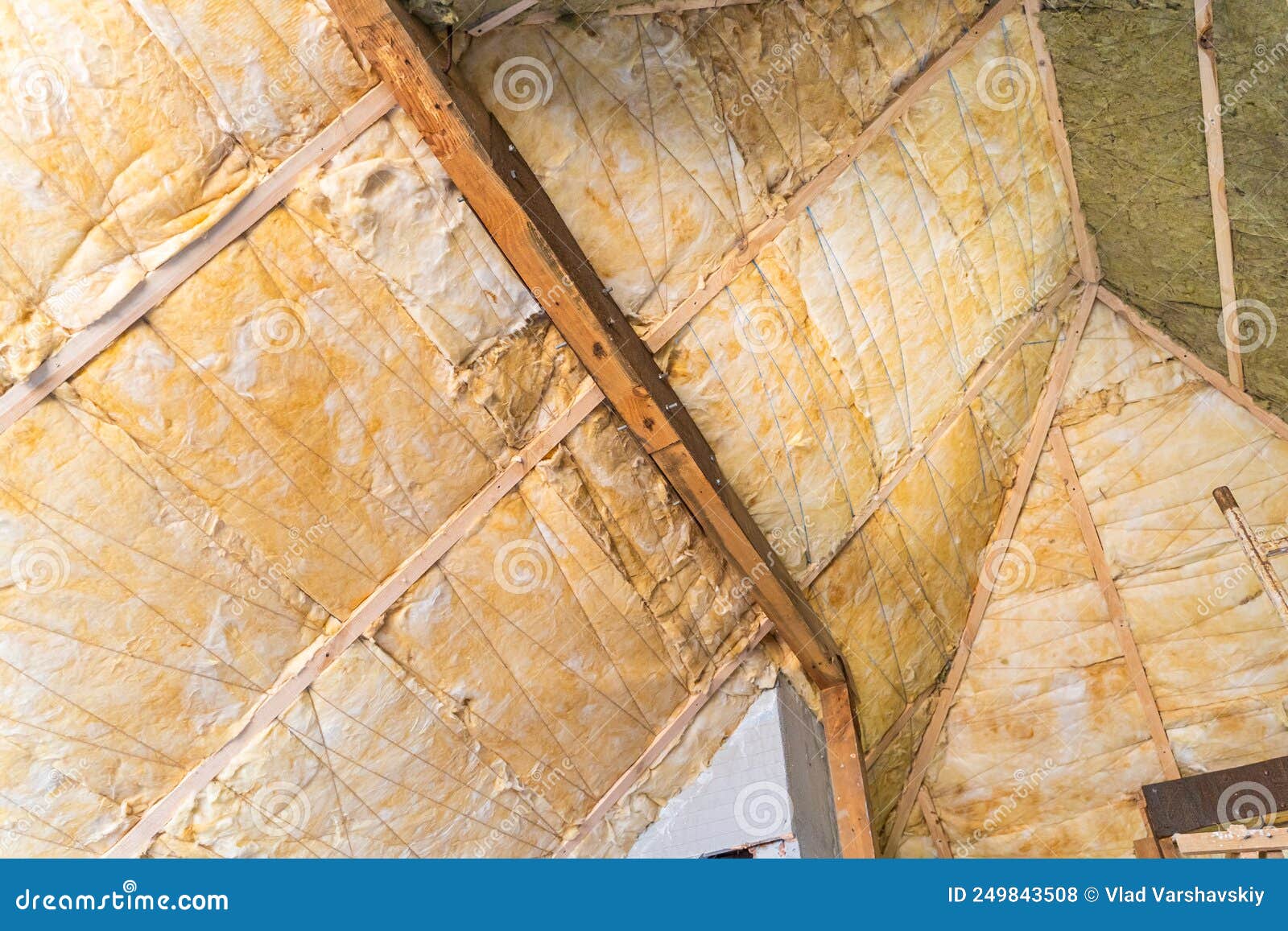The Roof is Insulated with the First Layer of Yellow Glass Wool Stock ...