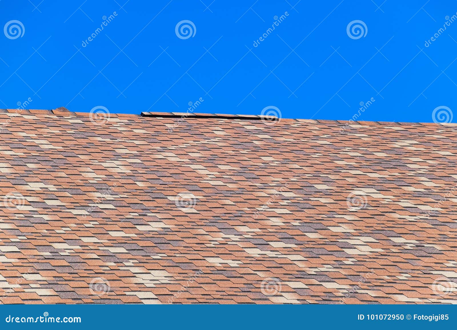 Roof from Multi-colored Bituminous Shingles. Patterned Bitumen Shingles ...