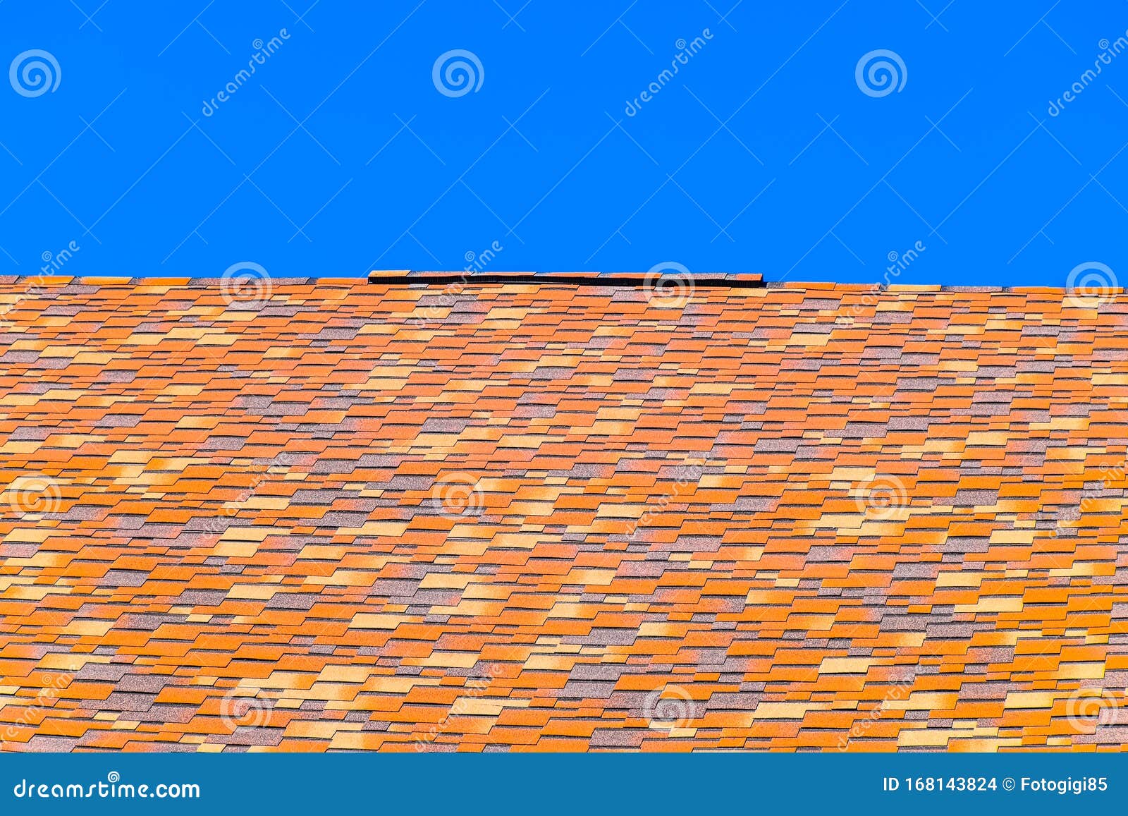 Roof from Multi-colored Bituminous Shingles. Stock Photo - Image of ...