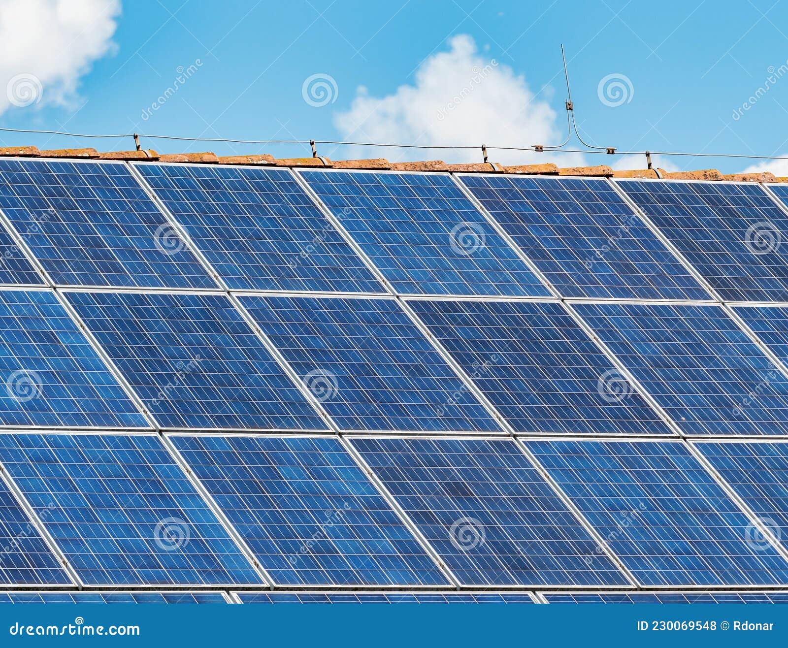 Roof with Solar Panel Reflecting the Sun Light in the Perfect Sky Stock ...