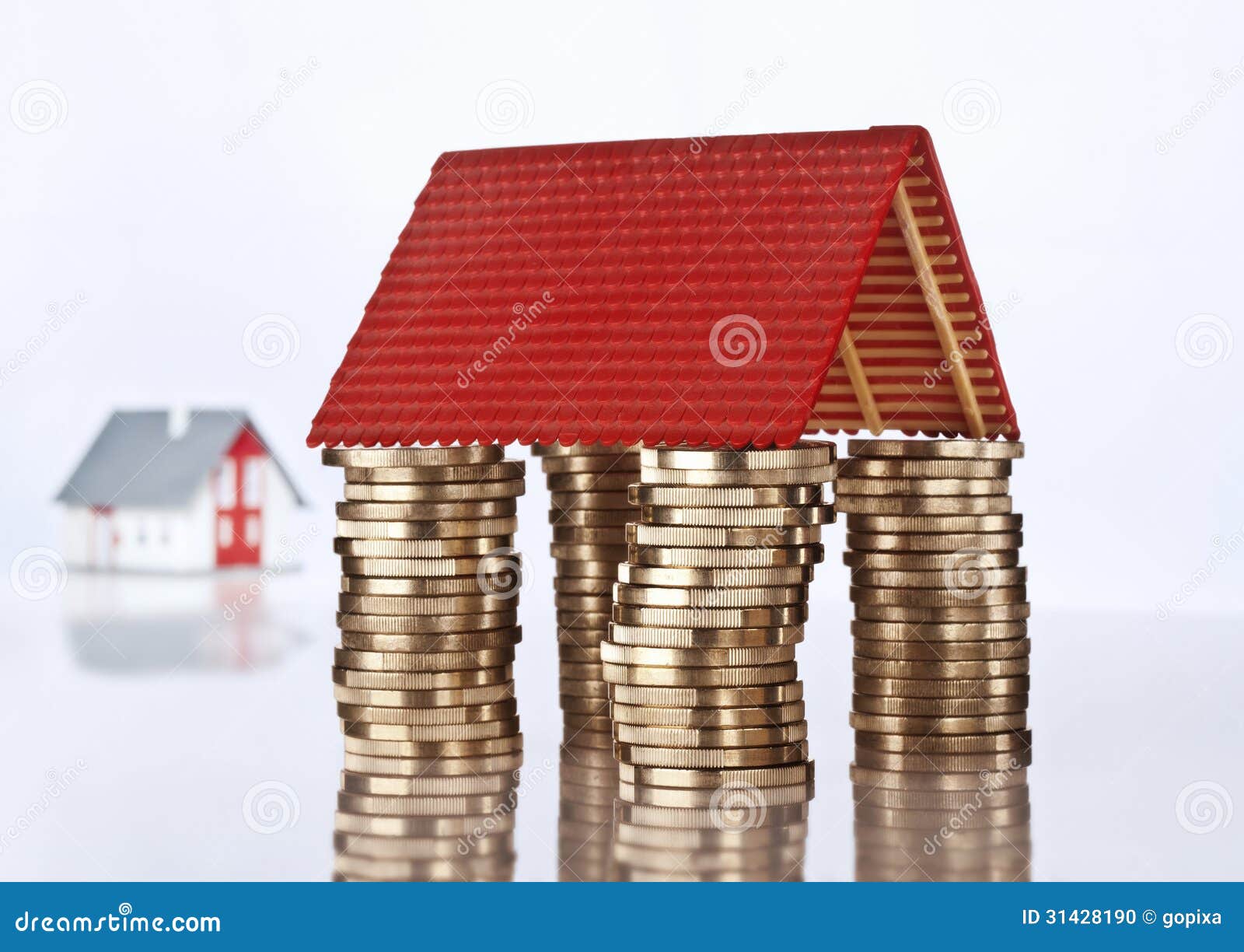Roof on stacked coins stock photo. Image of acquire, securities - 31428190