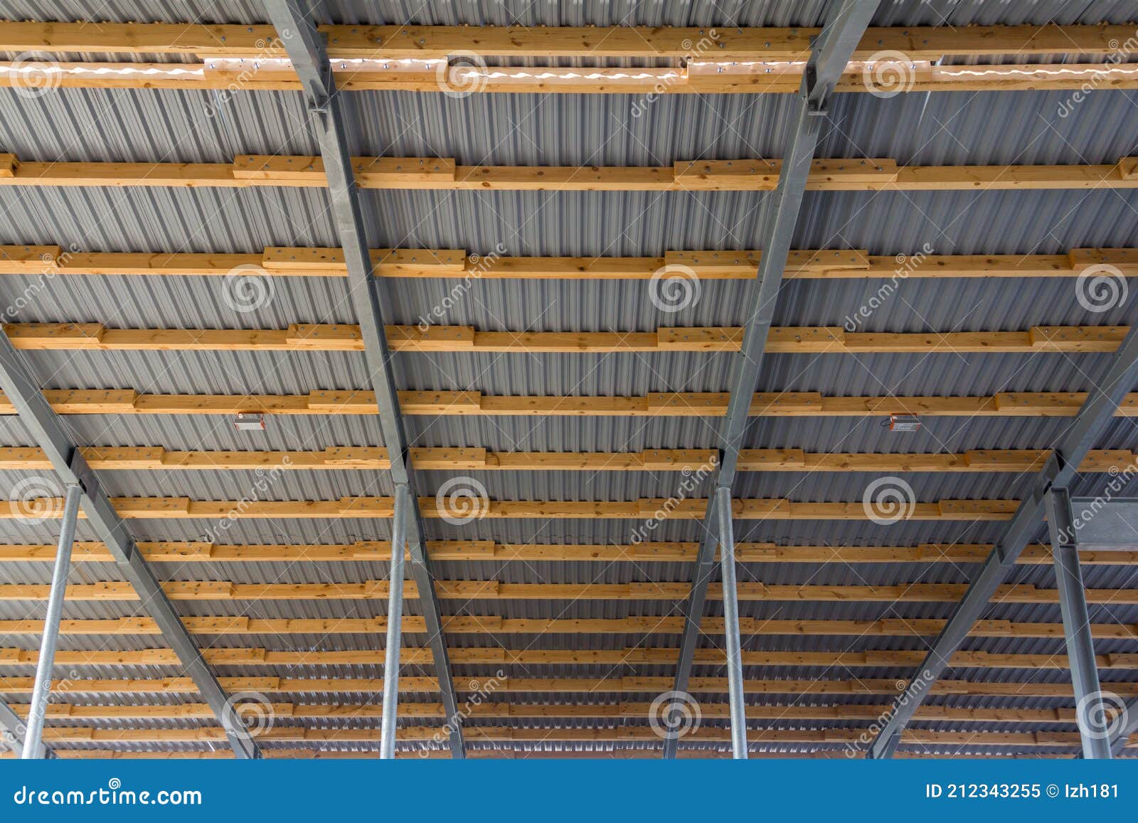 The Roof Structure Of A Large Hangar Consists Of A Steel Frame And ...