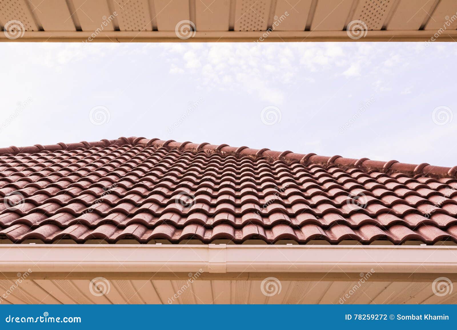 Roof Tiles and Rain Gutter Horizontal View Against Blue Sky Stock Photo ...