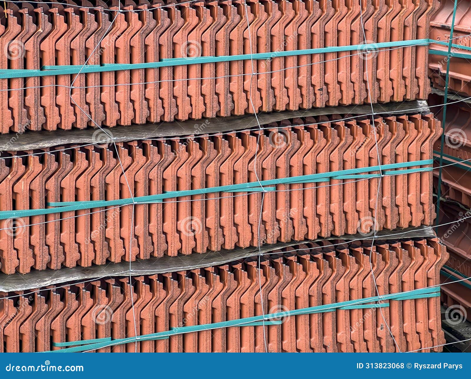 Roof Tiles Stacked on a Pallet, Visible from the Side As a Background ...