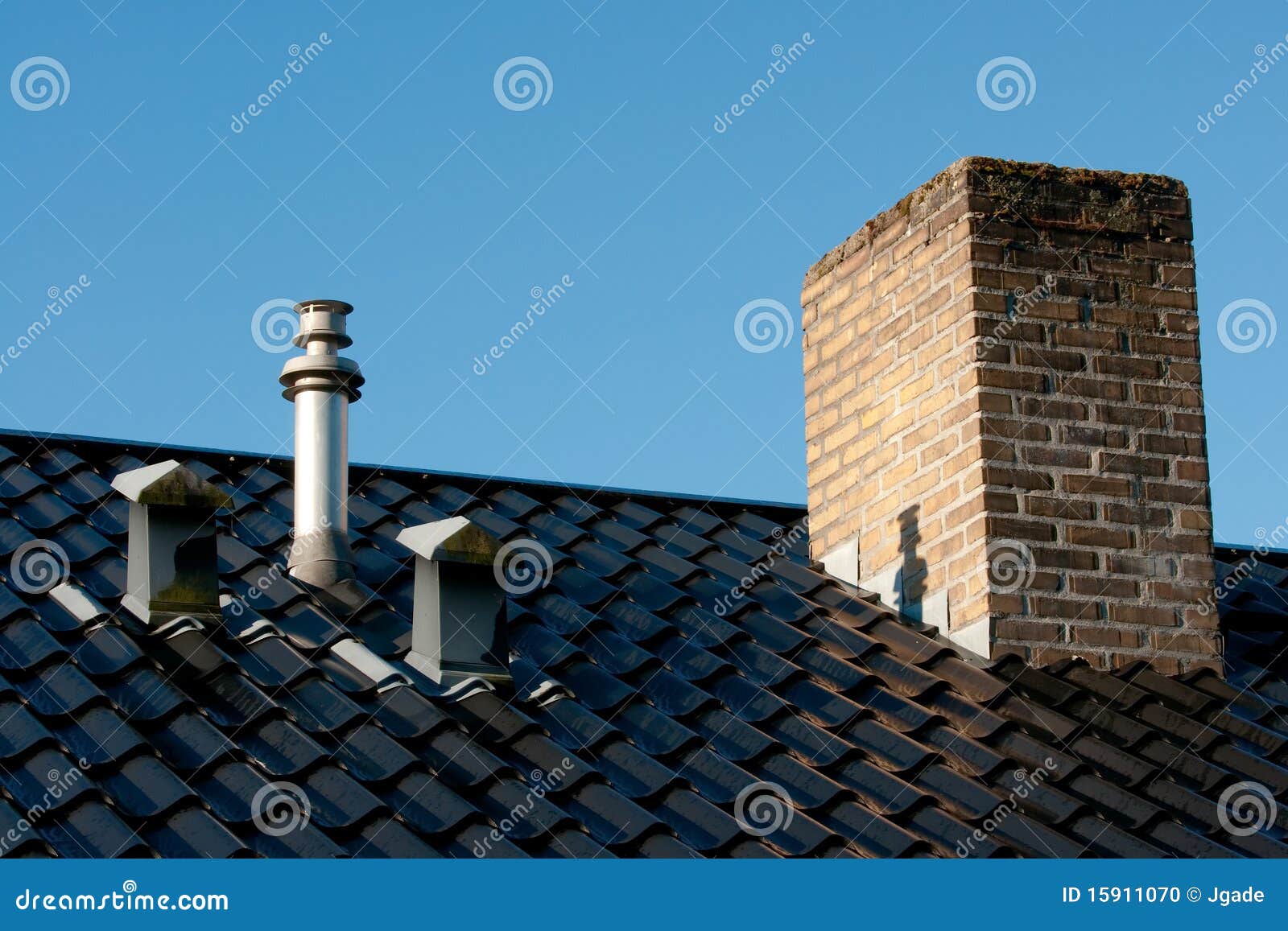 Roof with Ventilation, Flue Terminal and Chimney Stock Photo - Image of ...