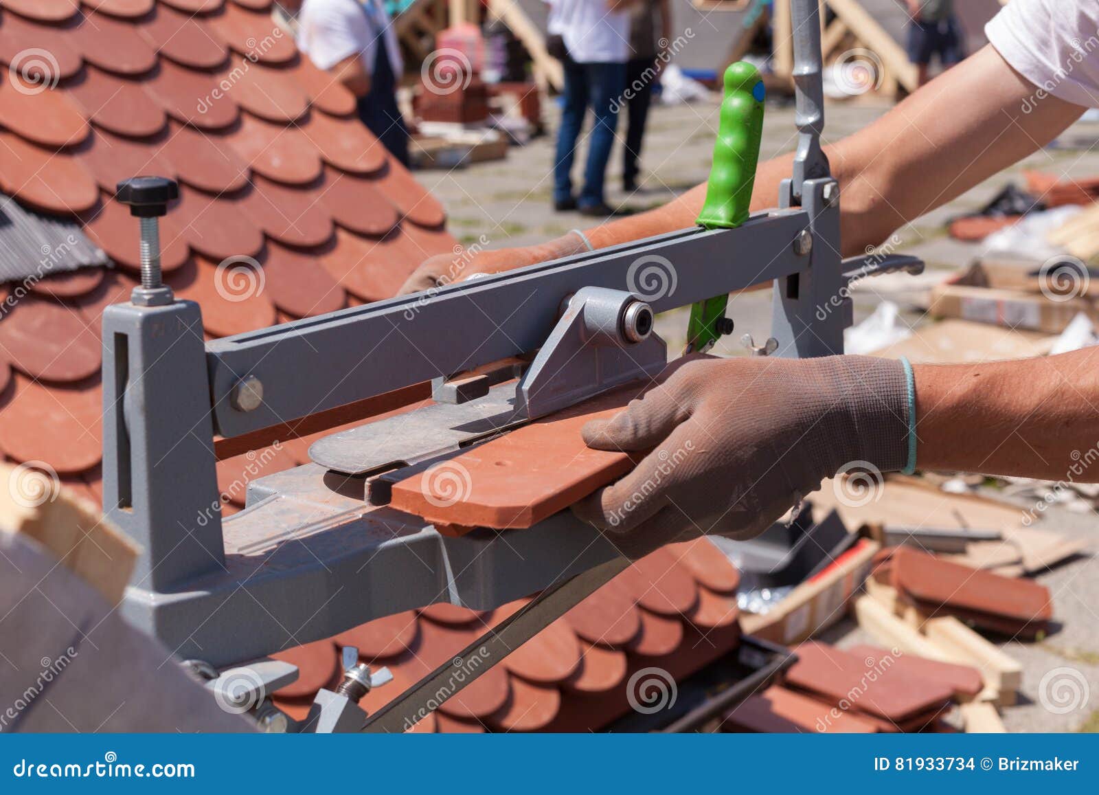 Roofer Builder Worker Use Tile Cutter To Create a Correct Size of ...