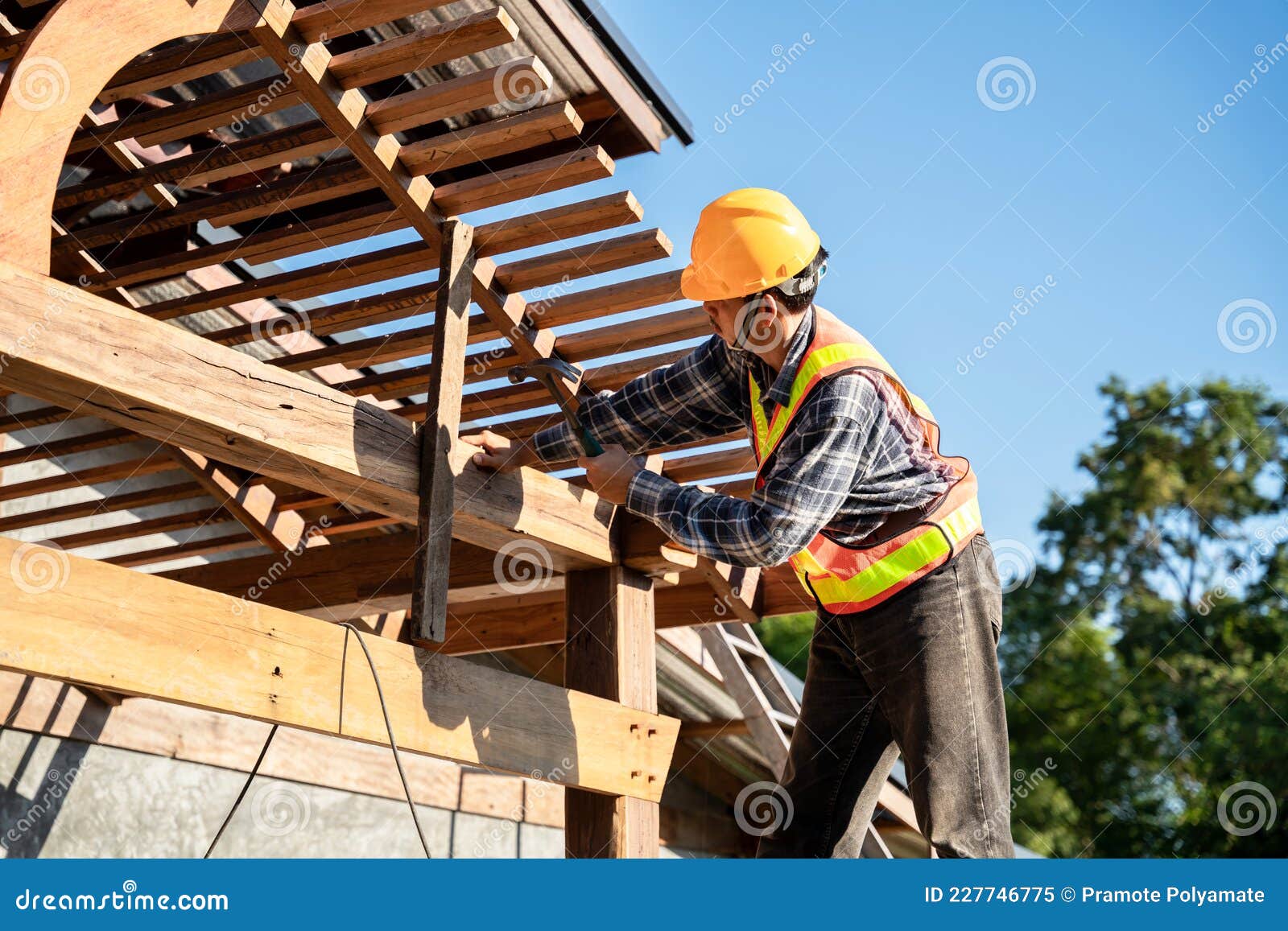 Roofer, a Carpenter Working on Roof Structure on Construction Site ...