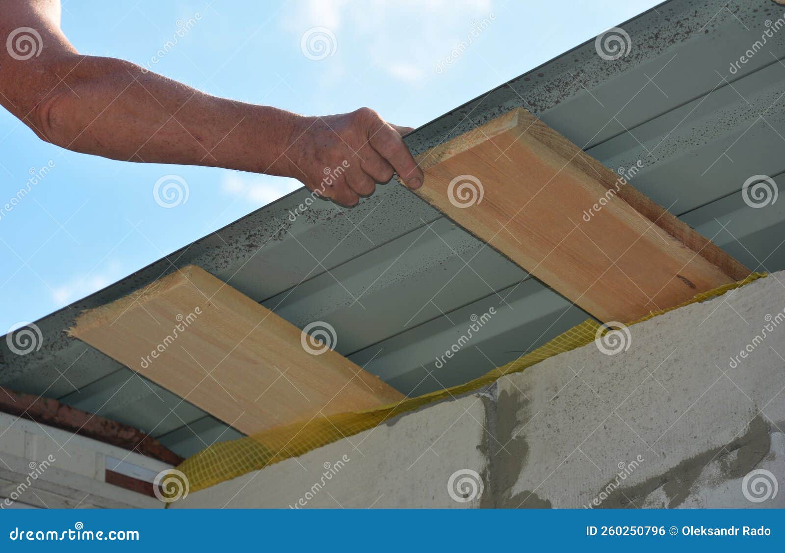 Roofer Installing Lightweight Metal Roofing Sheets on New House Rooftop ...