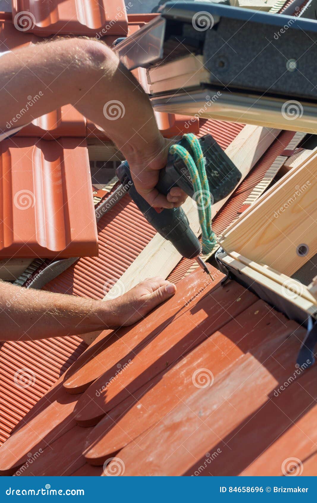 Roofer Installs a Skylight on the New Roof Using a Drill. Stock Photo ...