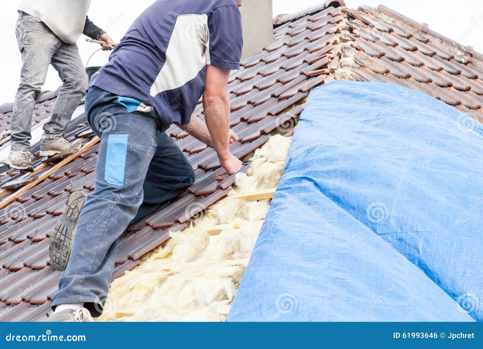 A Roofer Laying Tile on the Roof Stock Photo - Image of contractor ...