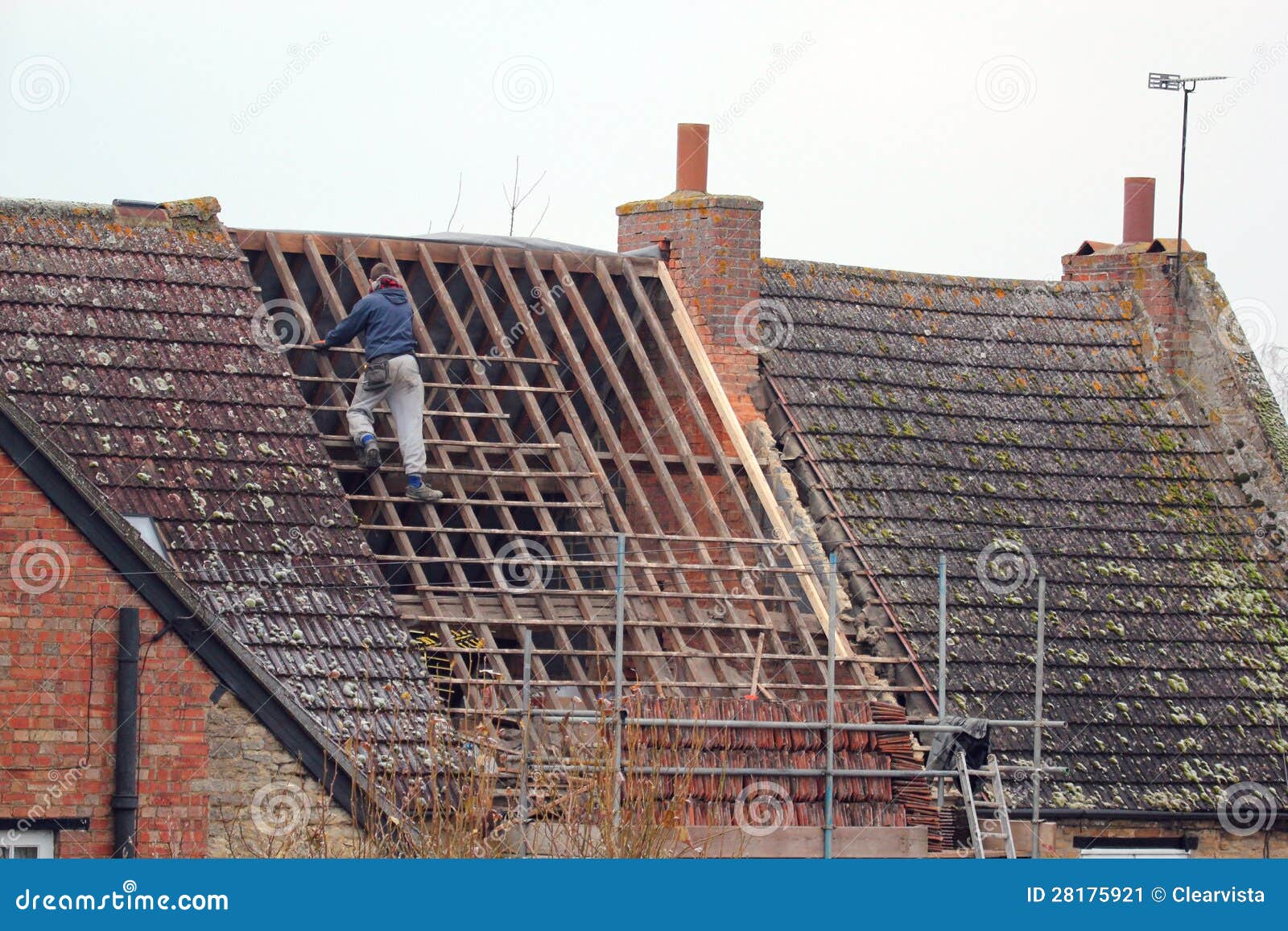 Roofer repairing roof. editorial photo. Image of cottage - 28175921