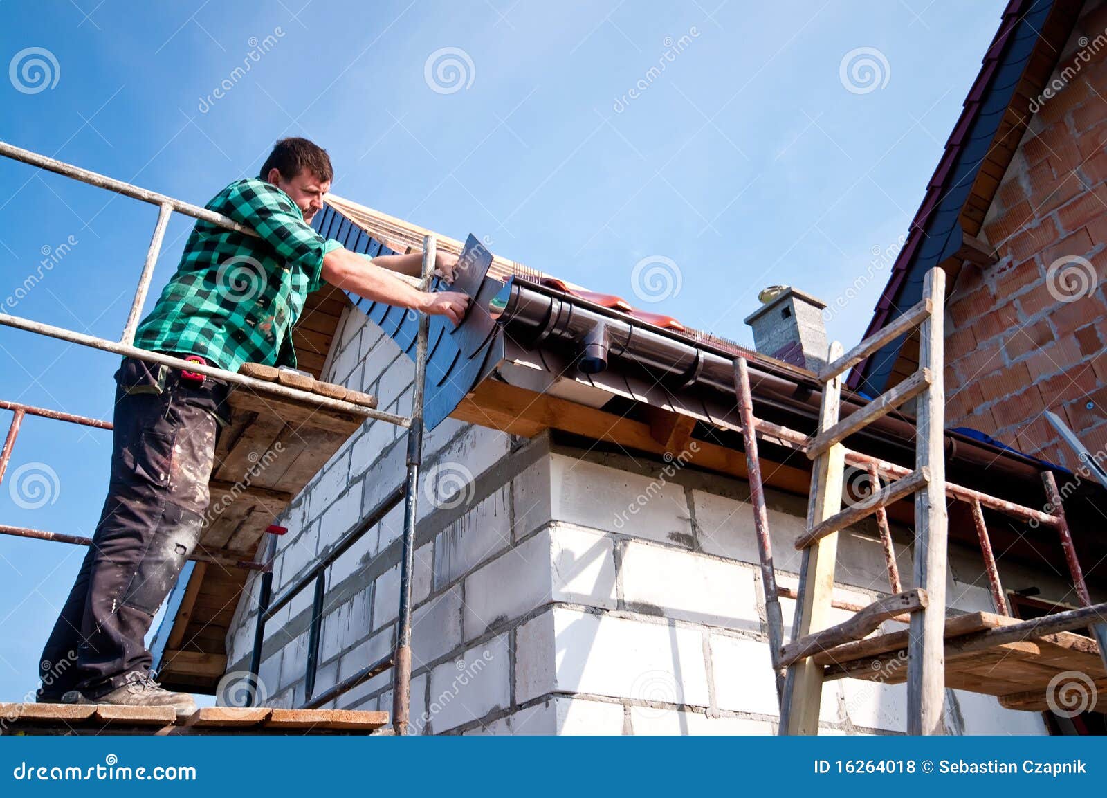Roofer at work stock photo. Image of roof, stands, working - 16264018