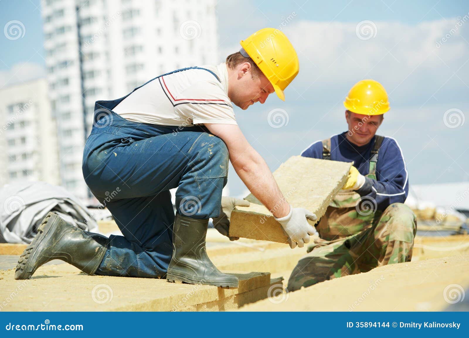 Roofer Worker Installing Roof Insulation Material Stock Photo - Image ...