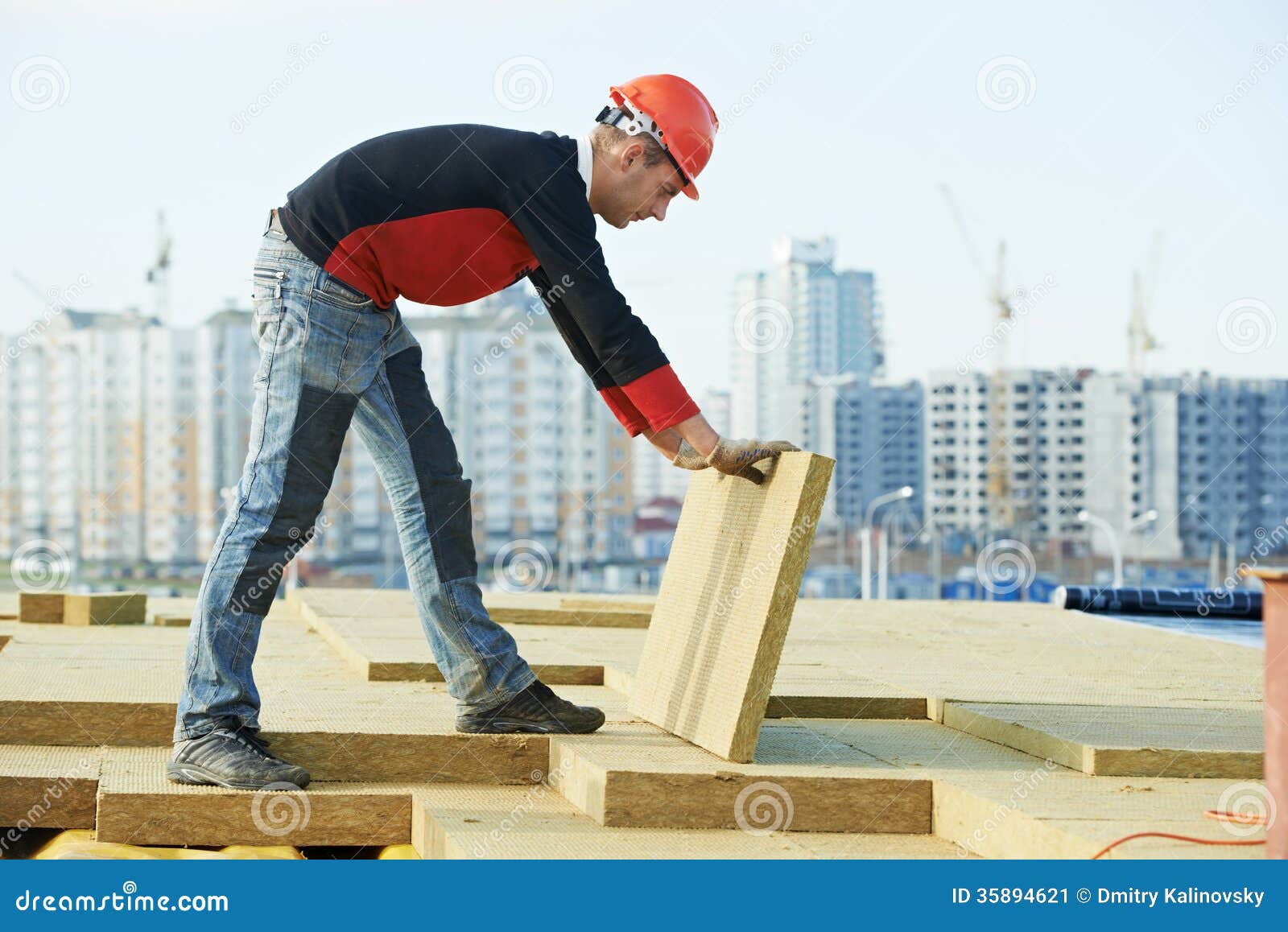 Roofer Worker Installing Roof Insulation Material Stock Image - Image ...