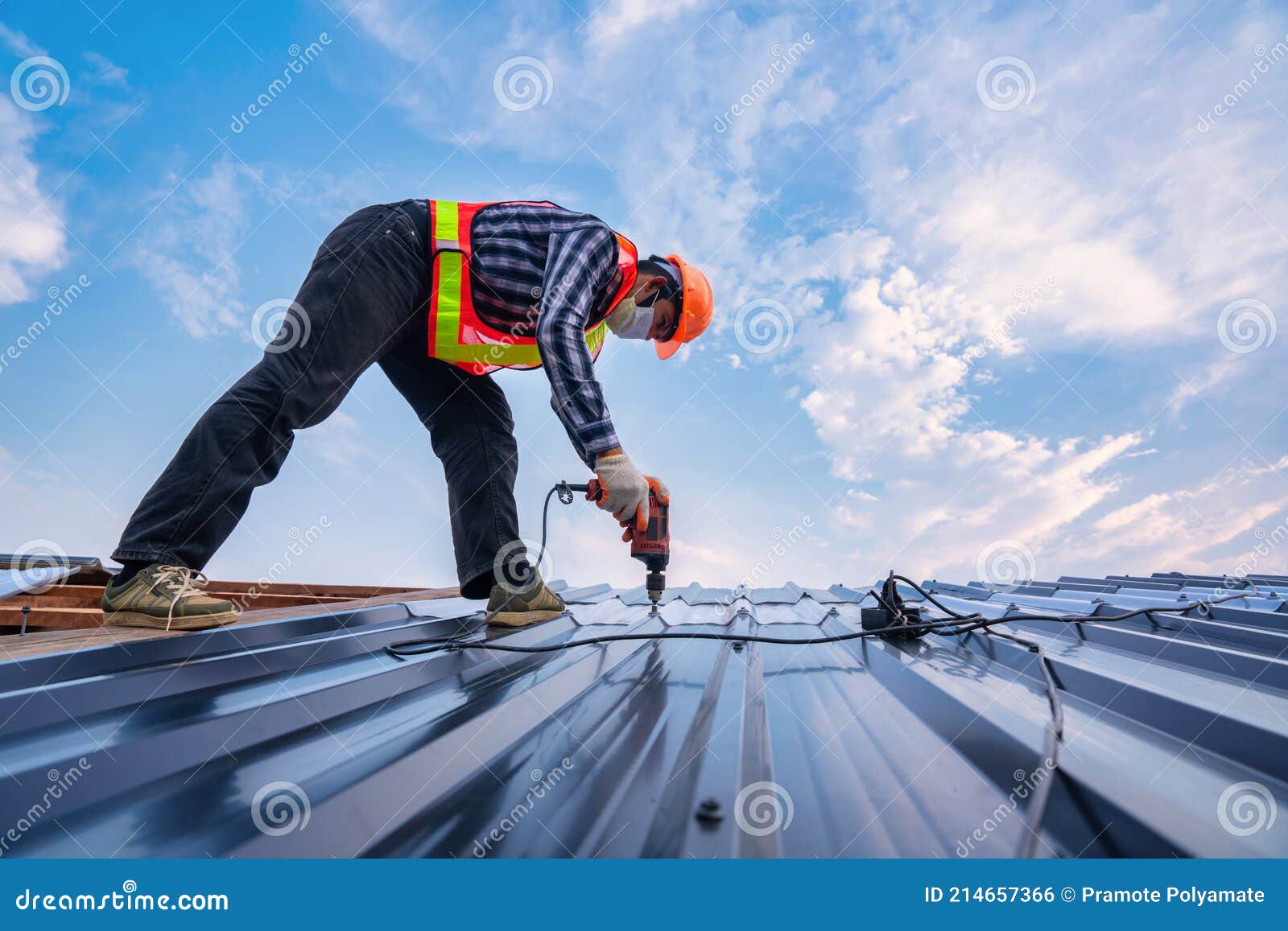Roofer Working on Roof Structure of Building in Construction Site ...