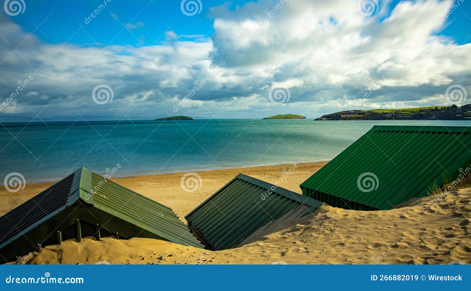 Roofing of Beach Huts on the Sand of an Island and Sea with Cloudy Sky ...