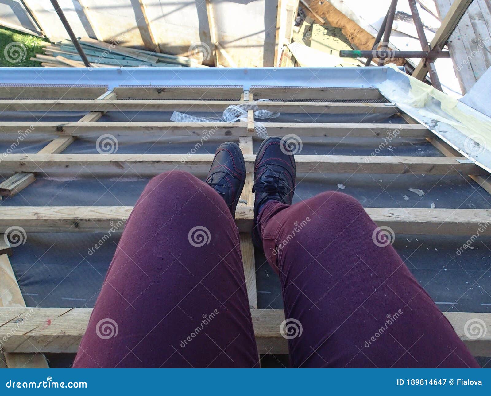 Roofing Work, the Constructor Inspects the Building on the Roof ...