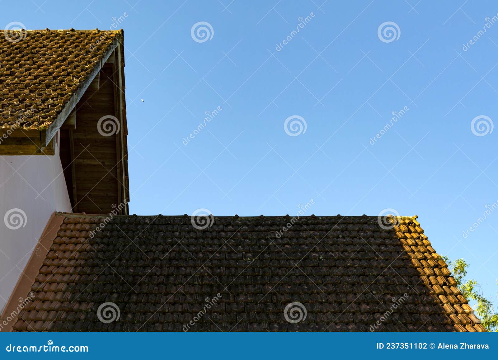 The Roofs on Background of Blue Sky Stock Photo - Image of cumulus ...