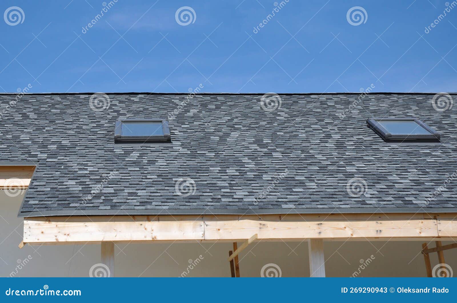 Rooftop House Construction with New Attic Skylight Windows and Asphalt ...