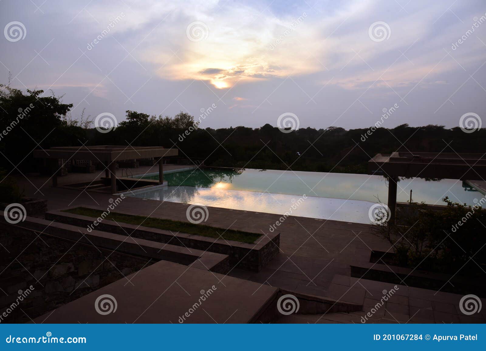 Rooftop Infinity Swimming Pool of Resort Stock Photo - Image of tree ...