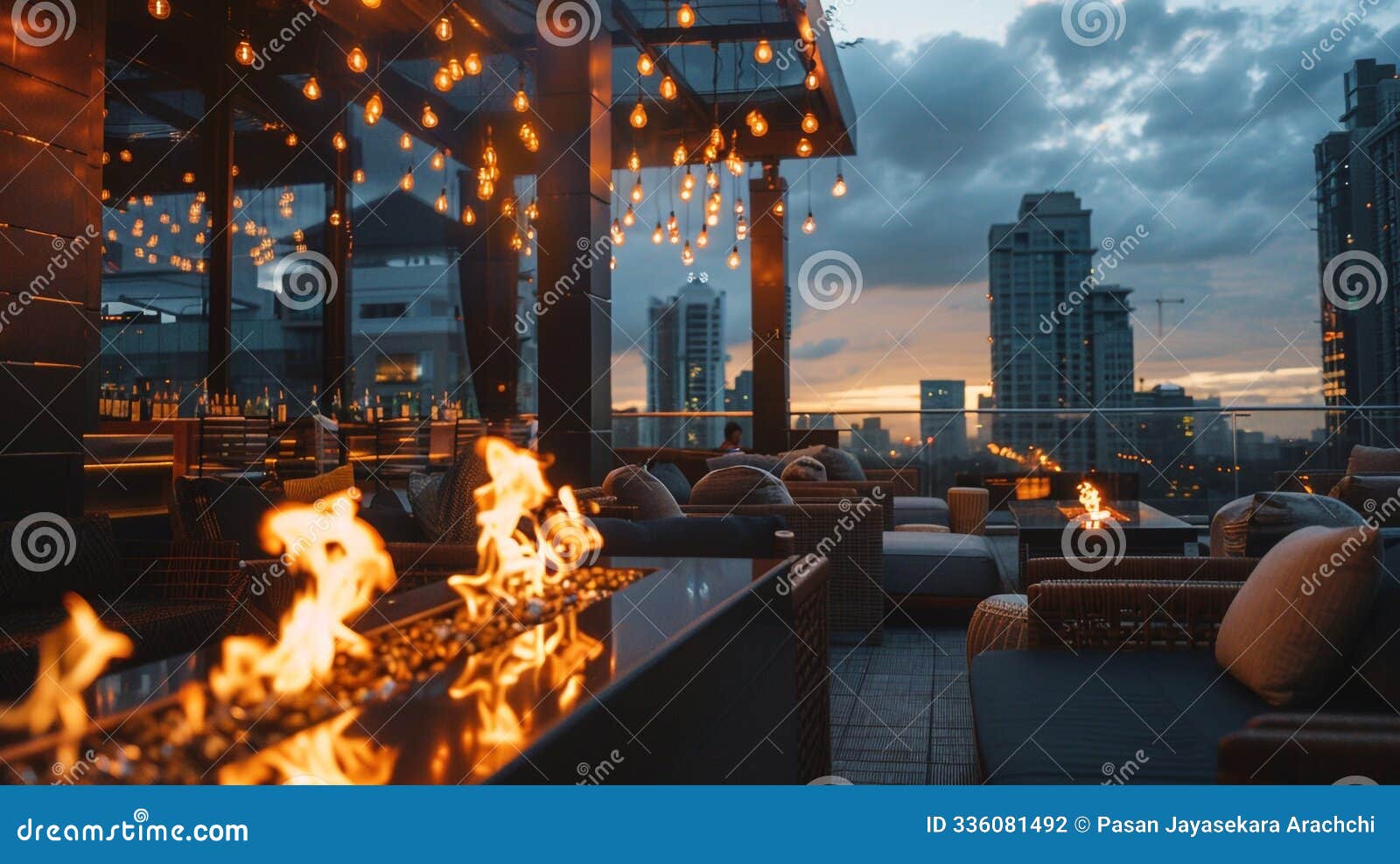 Rooftop Lounge Features Fire Pits With Cityscape Views Stock Photo ...