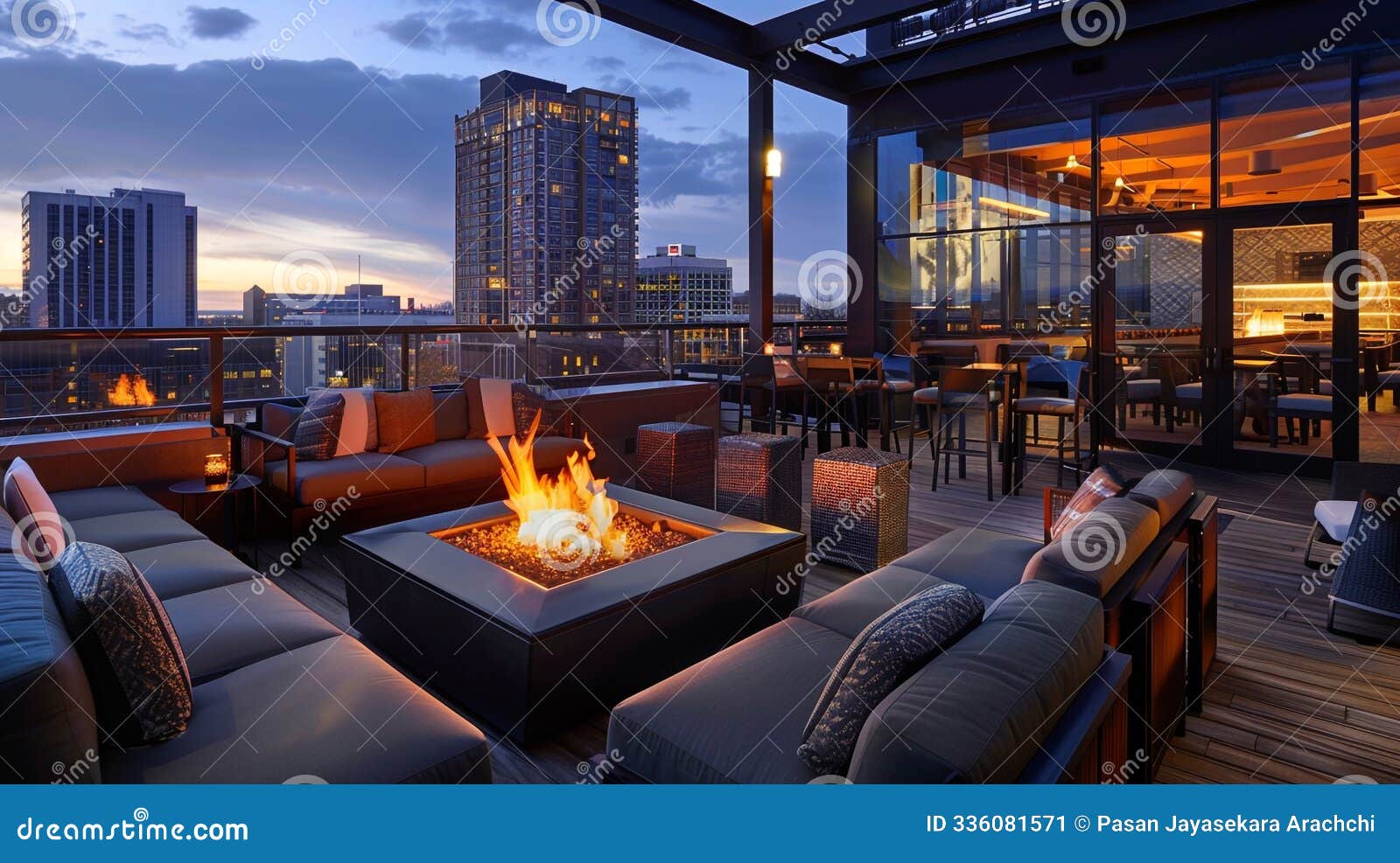 Rooftop Lounge Featuring Fire Pits And Cityscape Views Royalty-Free ...