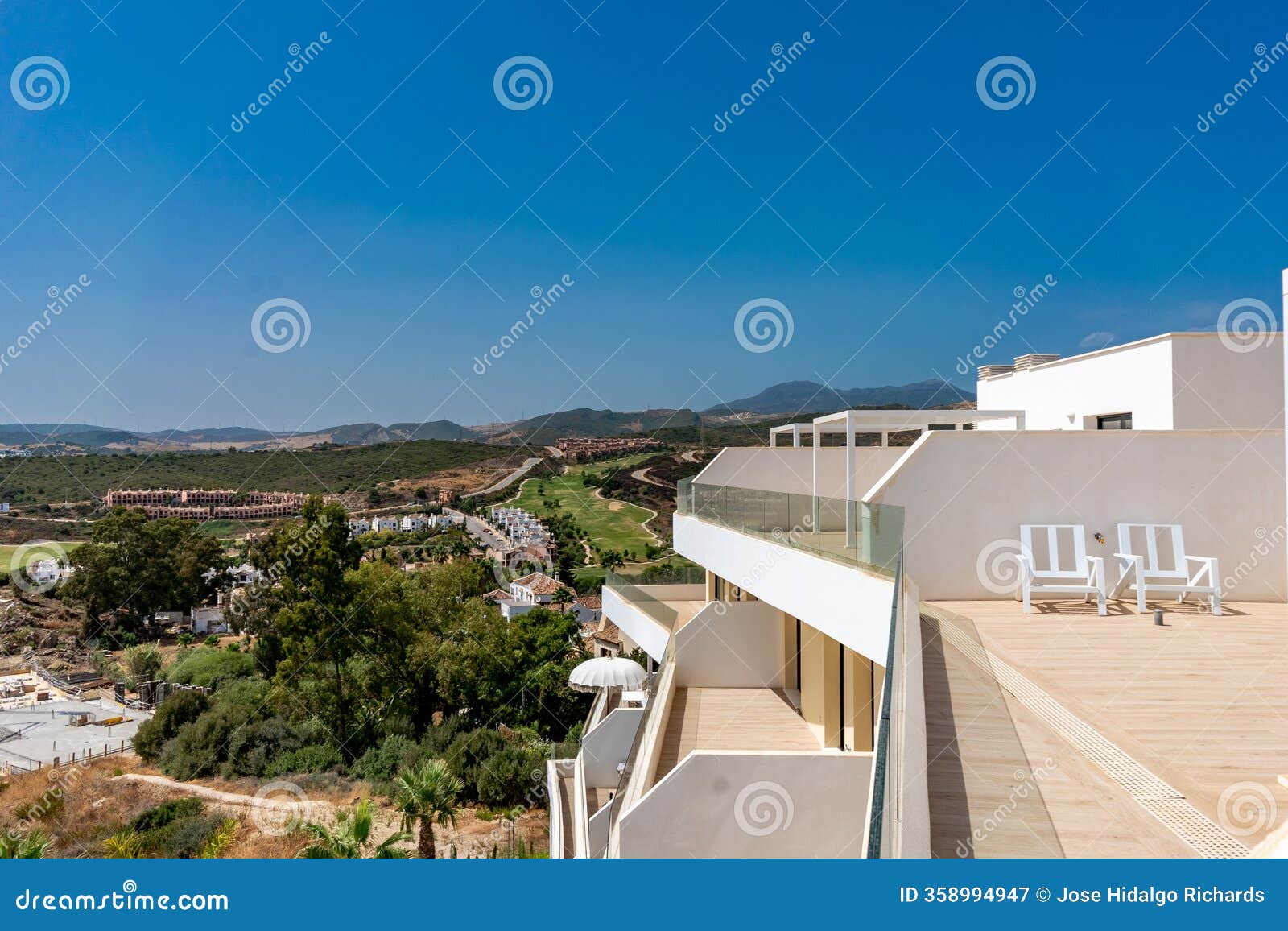 A Rooftop Terrace with Landscape Views of Mountains of the ...