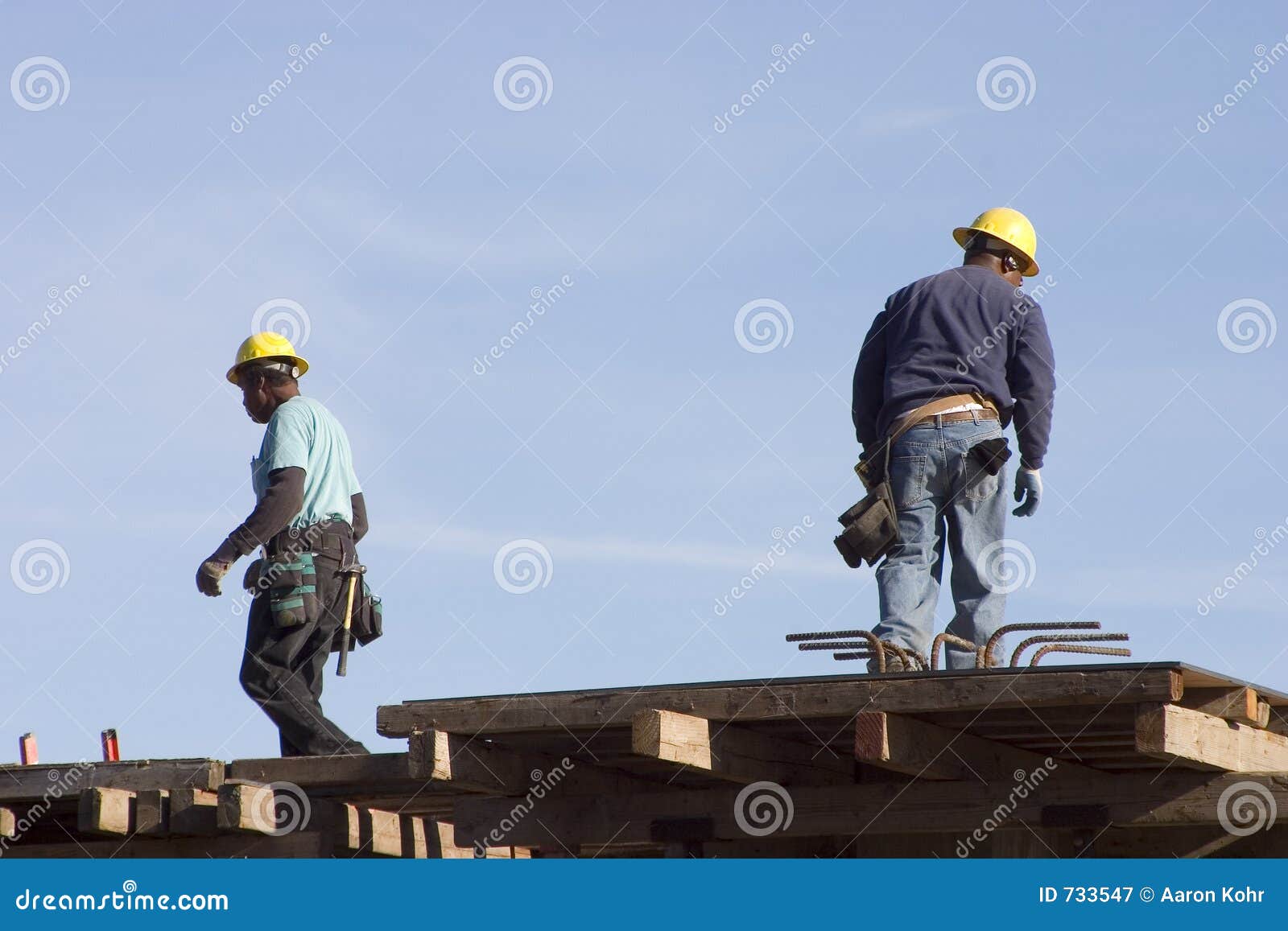 Rooftop Workers stock image. Image of assemble, build, blue - 733547