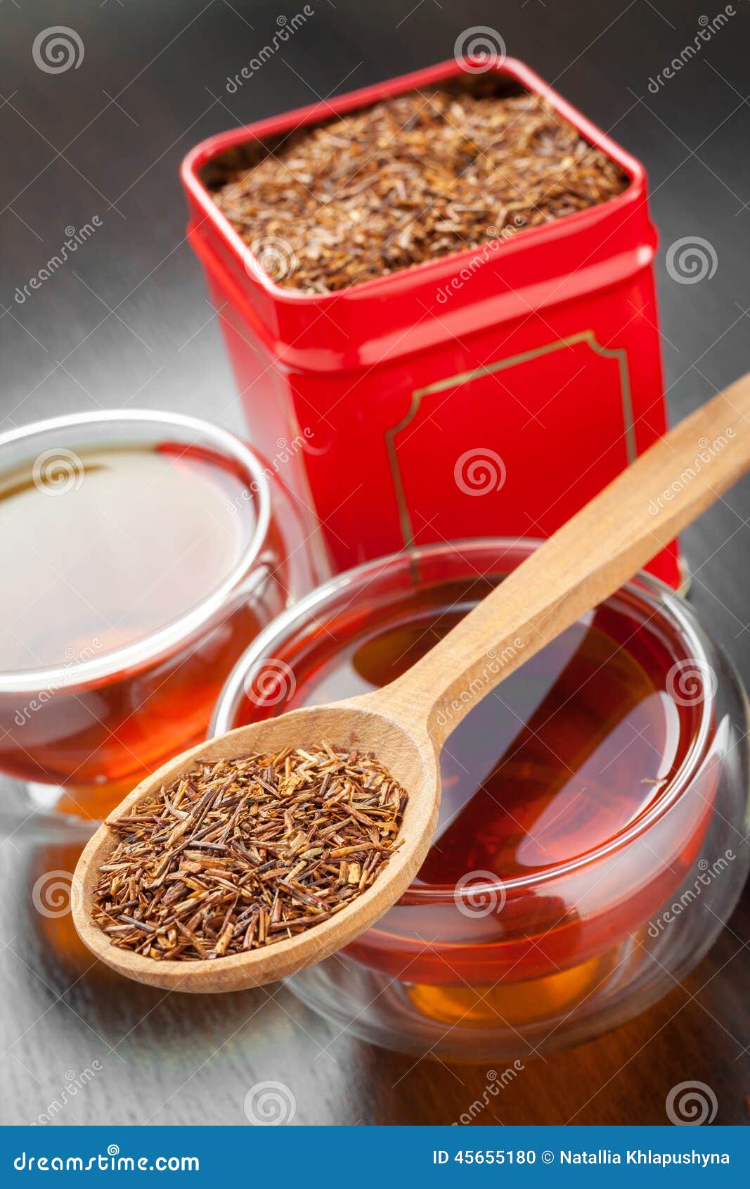 Rooibos in Wooden Spoon, Two Tea Cups and Tea Tin Box Stock Photo ...