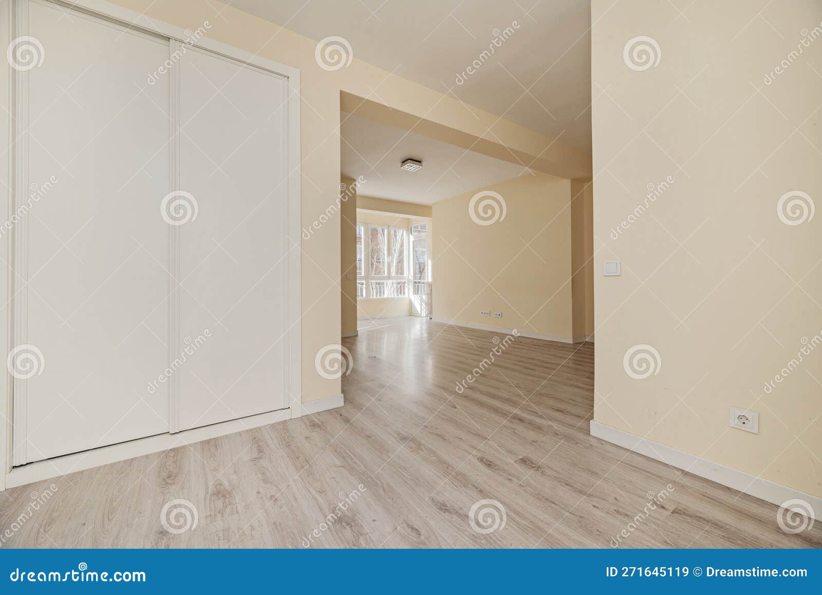 A Room with Irregular Walls with a Built-in Wardrobe with White Sliding ...