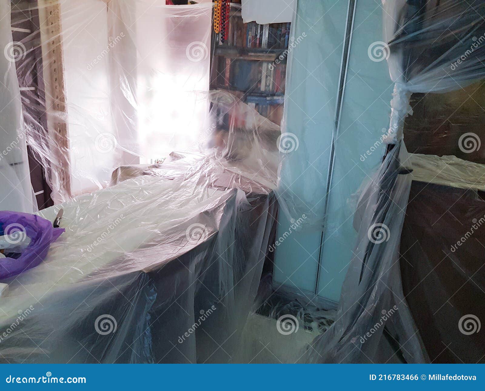 Room Ready for Renovation Covered with Plastic Wrap. Plastic Sheet ...