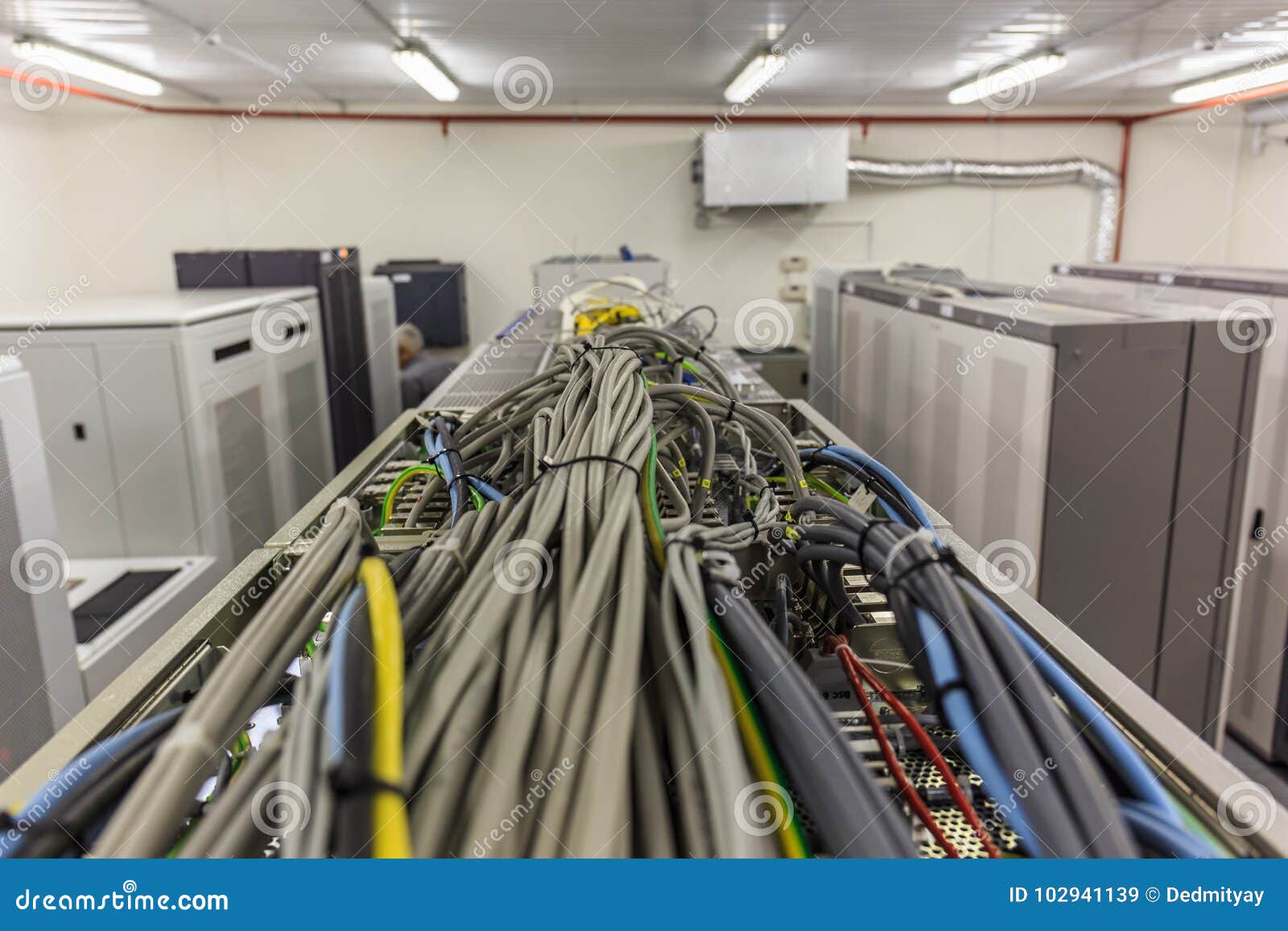 Room with Rows of Server Hardware in Data Center or Cellular Switch ...