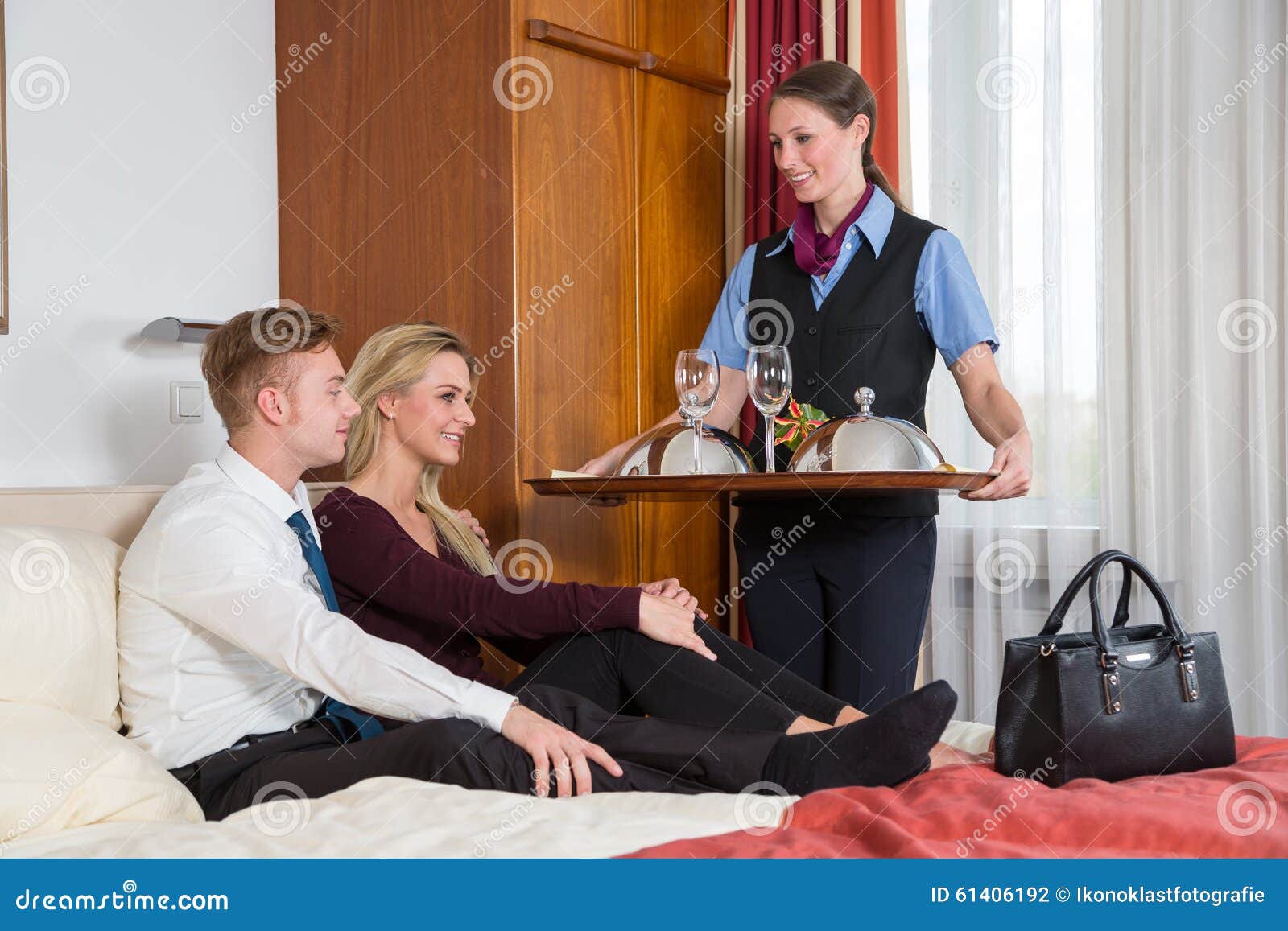 Room Service Bringing Couple Food and Wine Stock Photo - Image of male ...