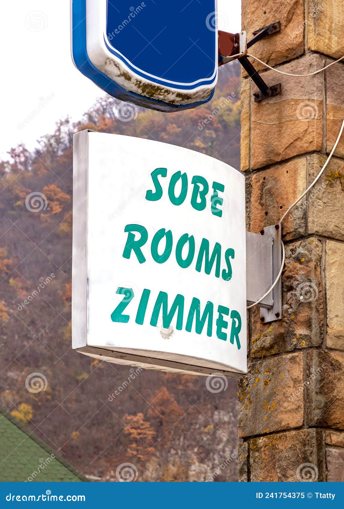 Rooms Sign on Building Facade Stock Image - Image of advertisement ...
