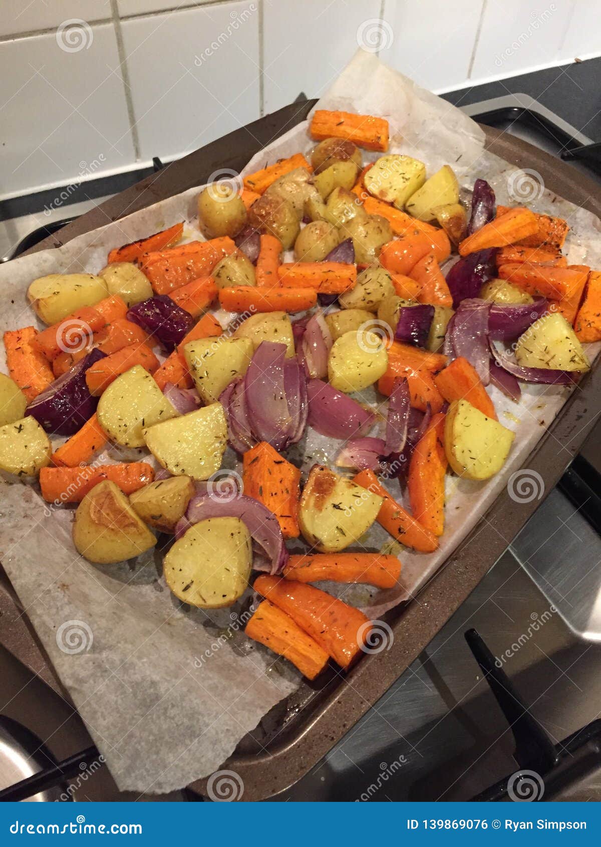 Root Vegetables on a Baking Tray Stock Photo - Image of orange ...
