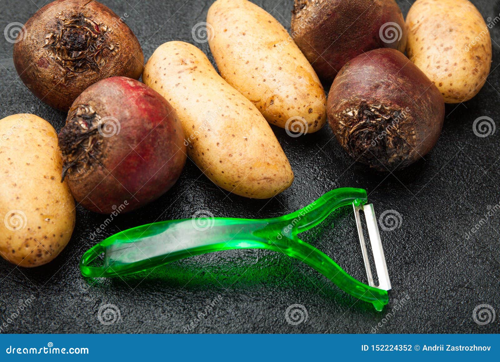 Roots of Potatoes and Red Beets with Vegetable Peelings Stock Photo ...