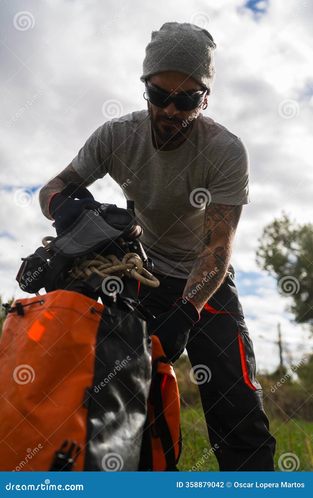 Rope Access Technician Preparing Equipment for Tree Pruning Stock Photo ...