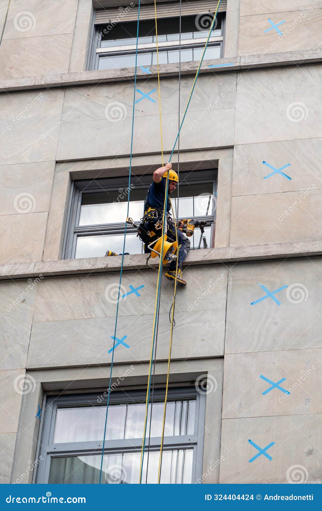 Rope Access Abseiler Wearing Red Safety Fall Protection Helmet Working ...