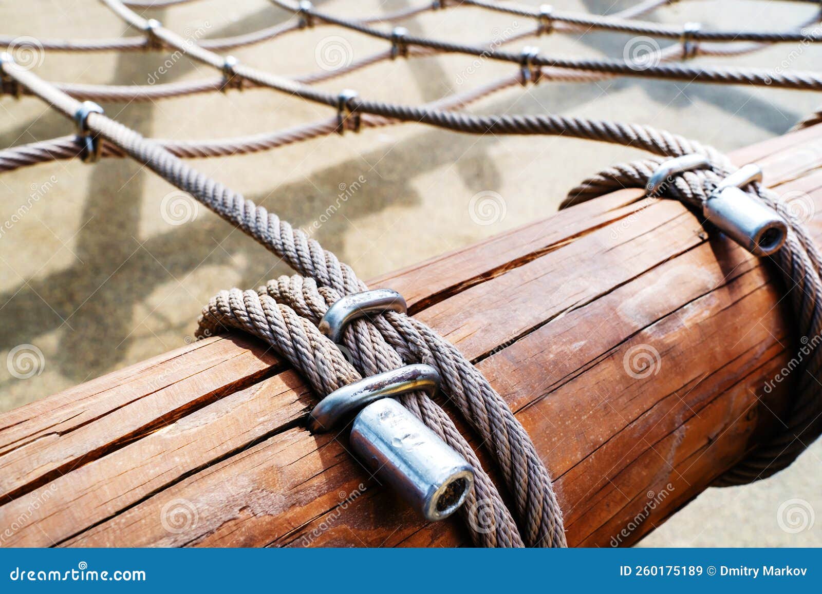 The Rope is Attached with Metal Staples To a Large Log. Construction of ...