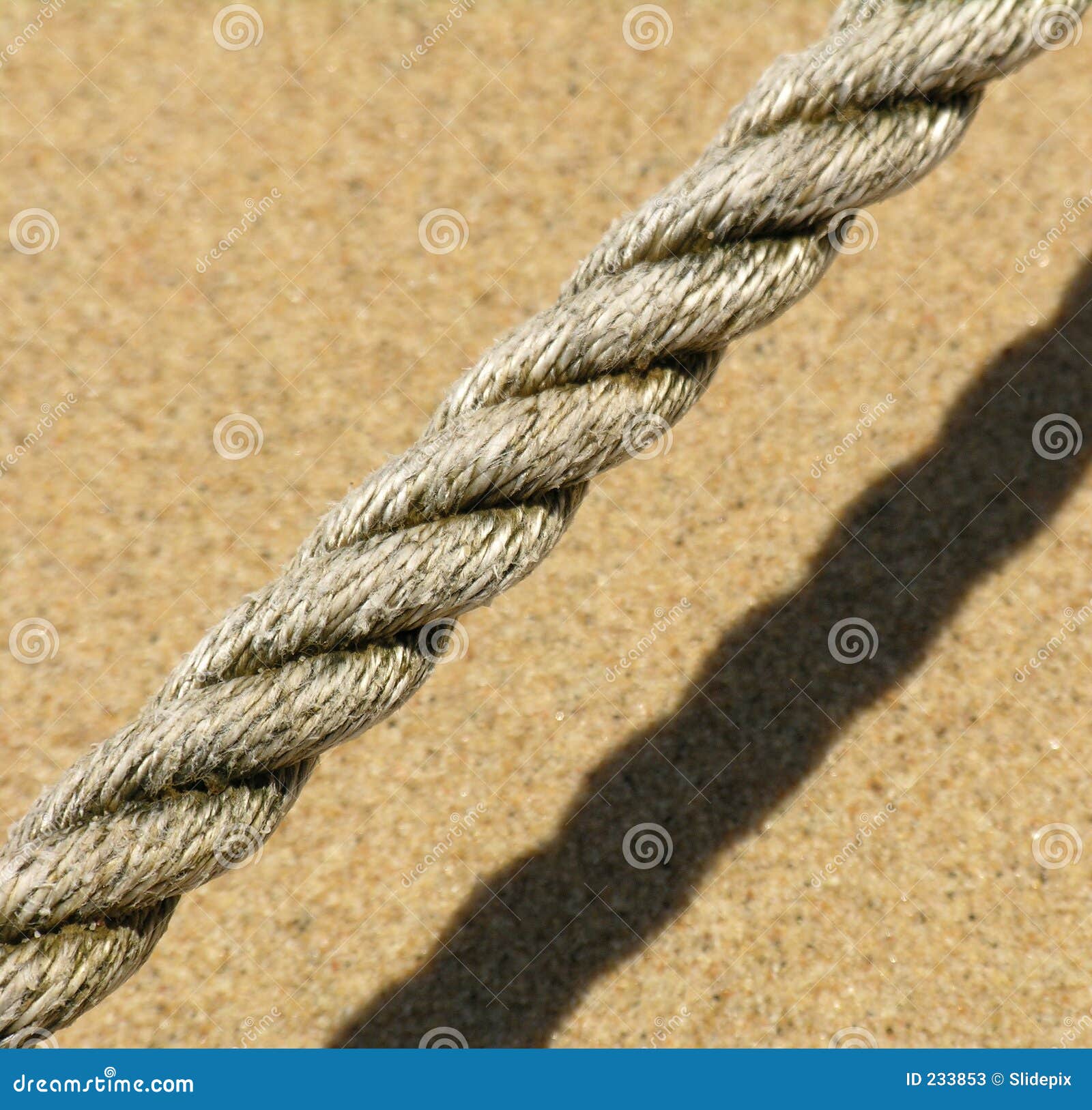 Rope on the beach stock image. Image of closeup, shade - 233853