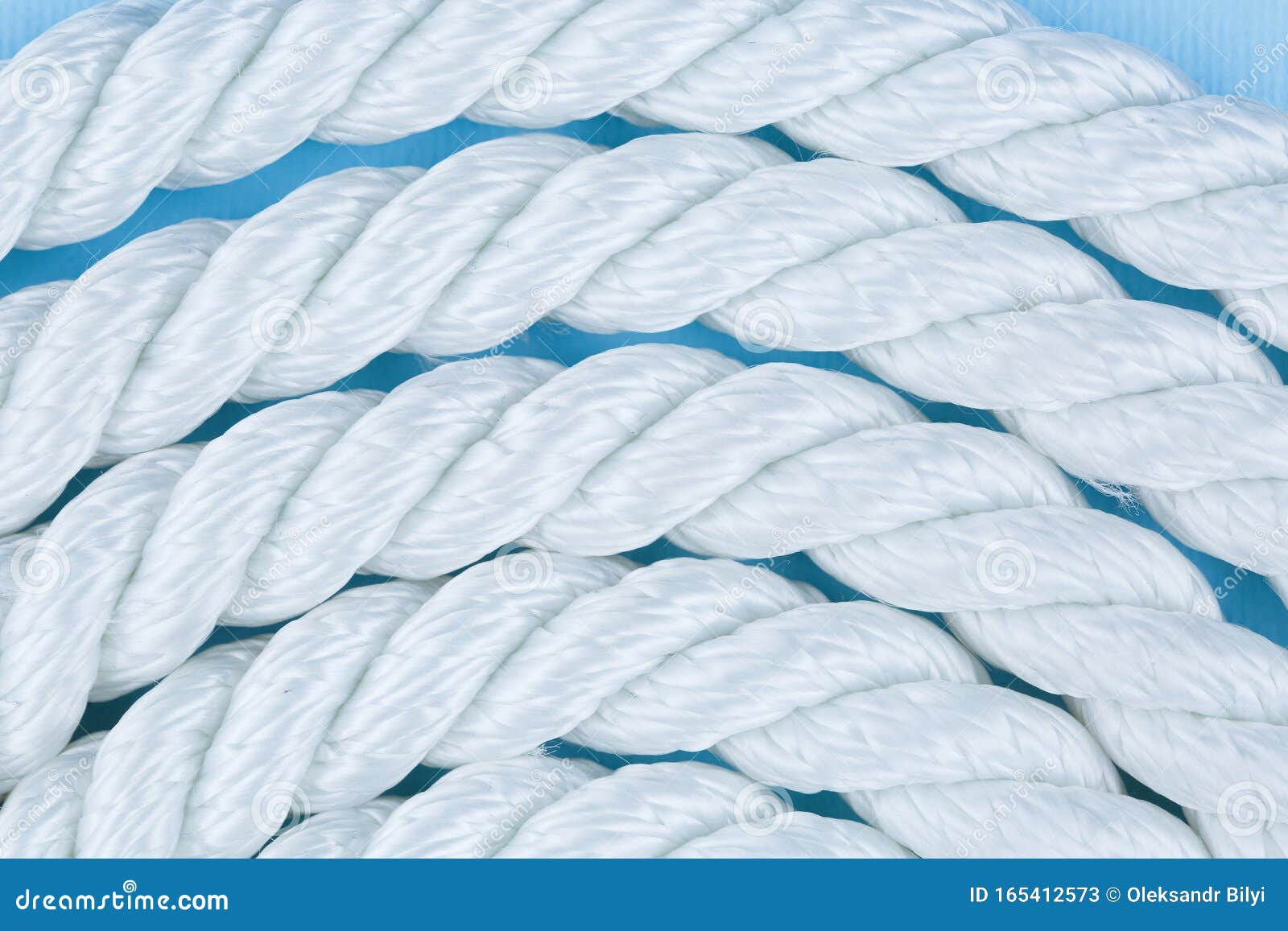Rope on a blue background stock image. Image of copy - 165412573