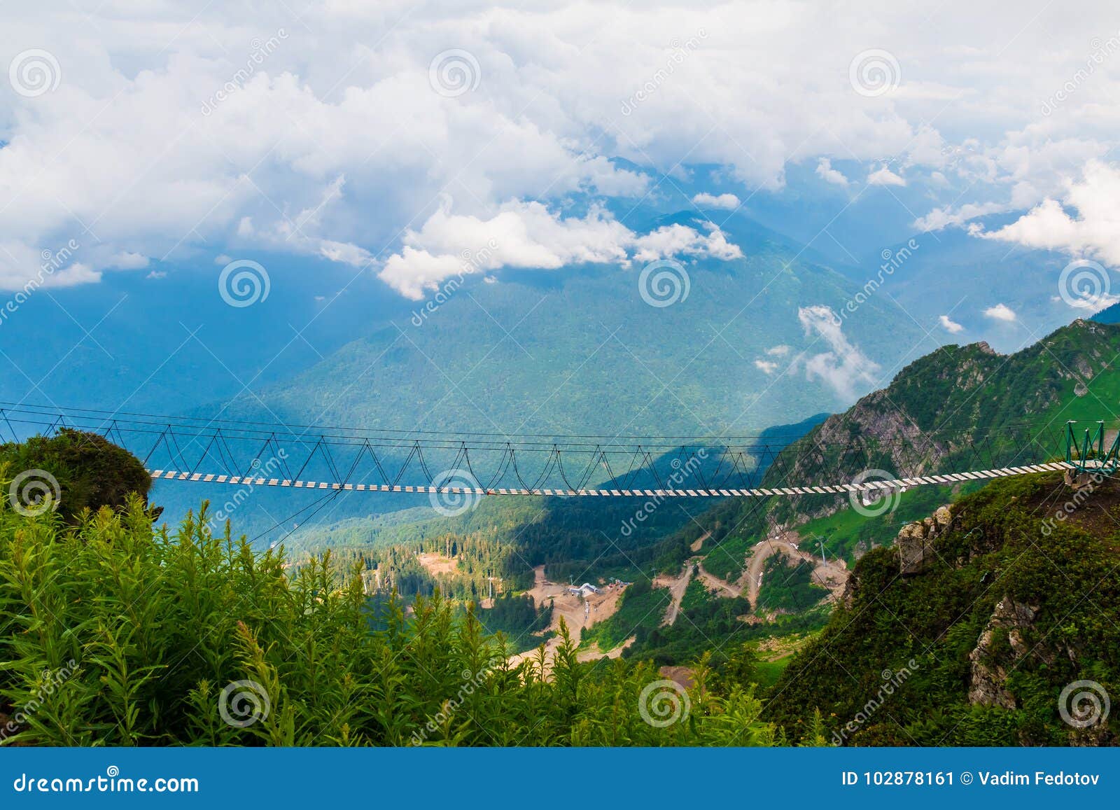 Rope bridge in mountains stock image. Image of bridge - 102878161