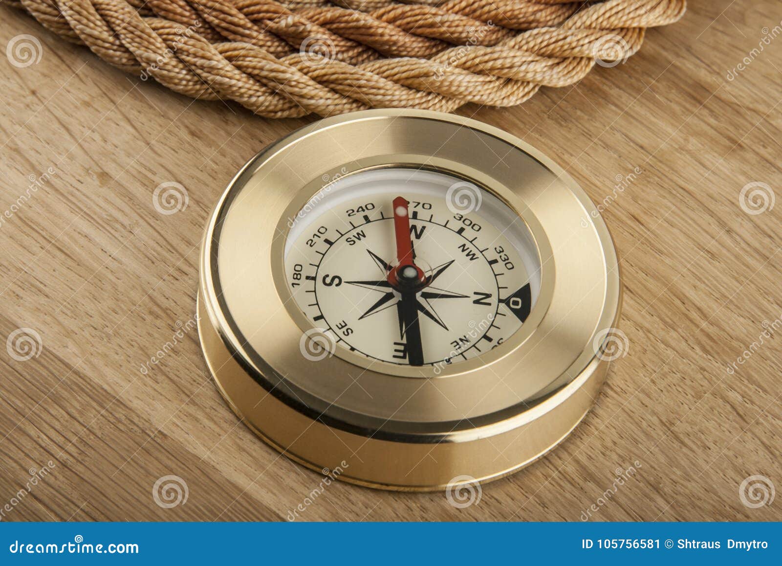 Rope and Compass on a Wooden Stock Image - Image of design, compass ...
